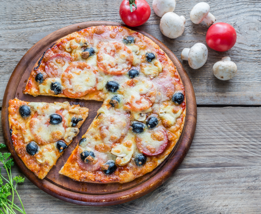 cooked-pizza-on-the-wooden-board-PDL4KCX - Pizzeria Atlantic